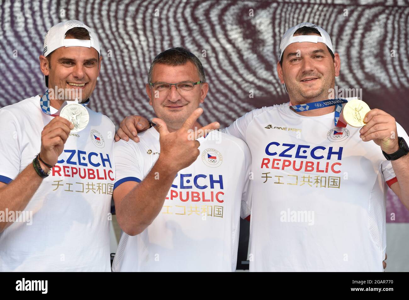 Brno, Czech Republic. 31st July, 2021. Gold medalist Jiri Liptak, right ...