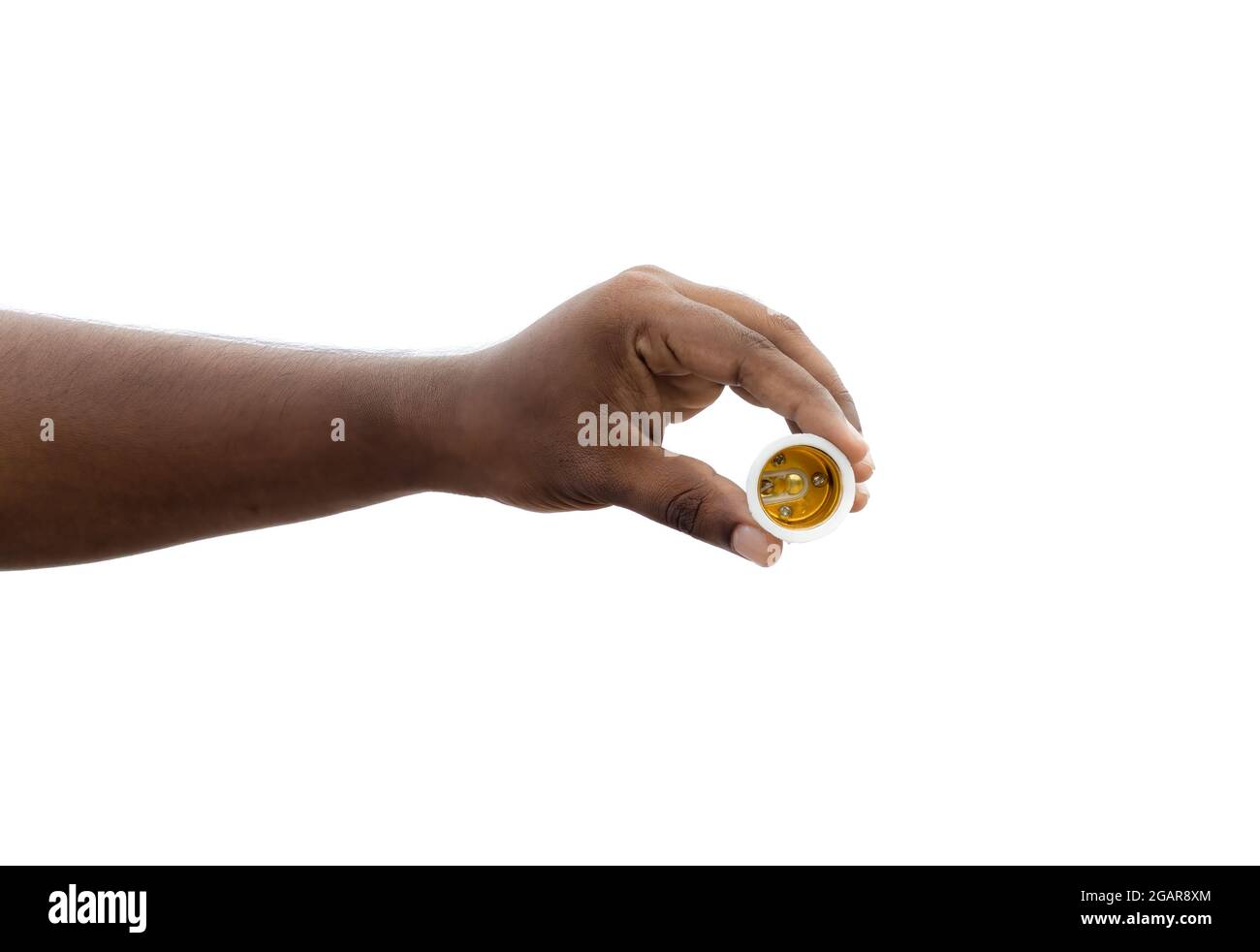 Traditional light holder holding a hand on isolated white background ...