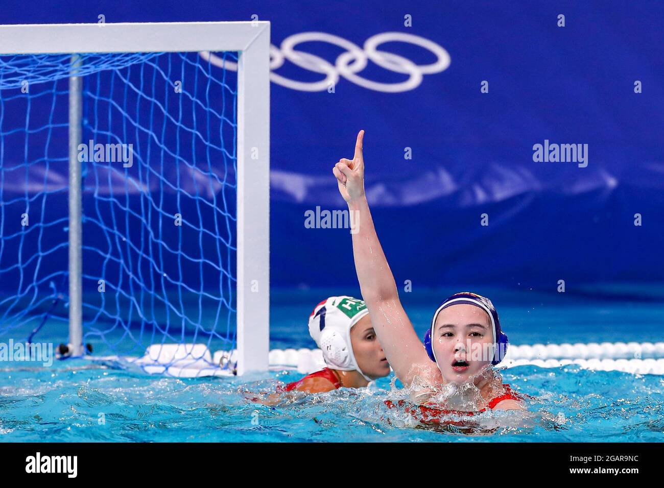 TOKYO, JAPAN - AUGUST 1: Dunhan Xiong of China, Anna Illes of Hungary ...