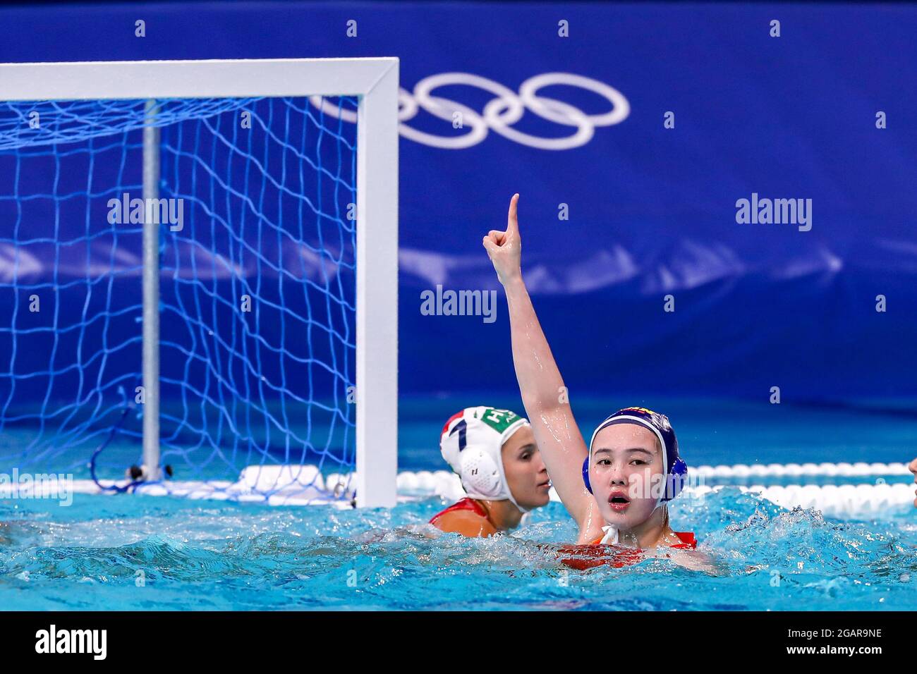 TOKYO, JAPAN - AUGUST 1: Dunhan Xiong of China, Anna Illes of Hungary ...
