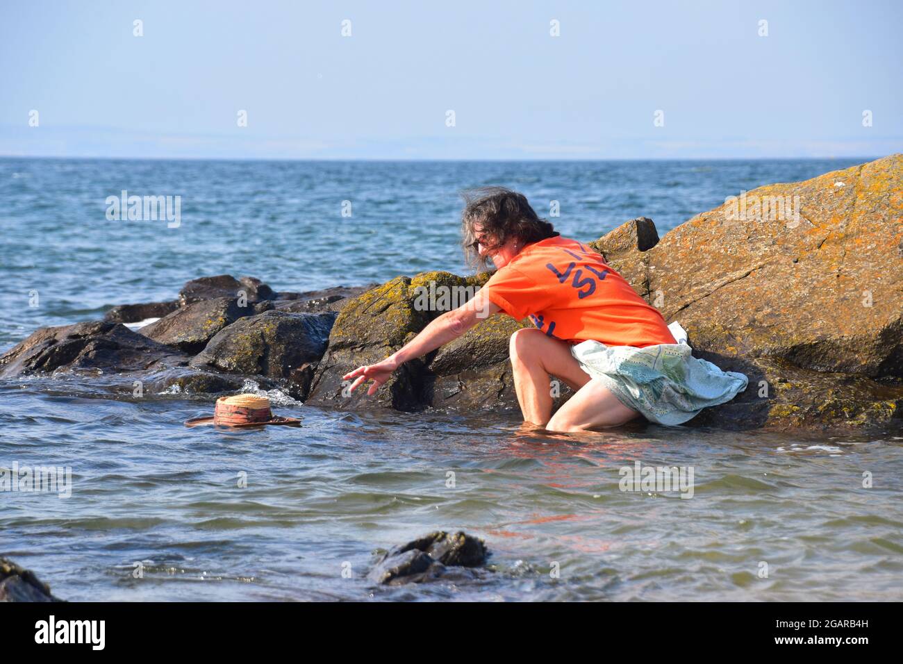 Hat came off hi-res stock photography and images - Alamy