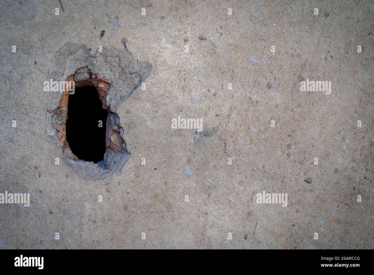 A closeup of a hole on a polished plaster wall Stock Photo - Alamy