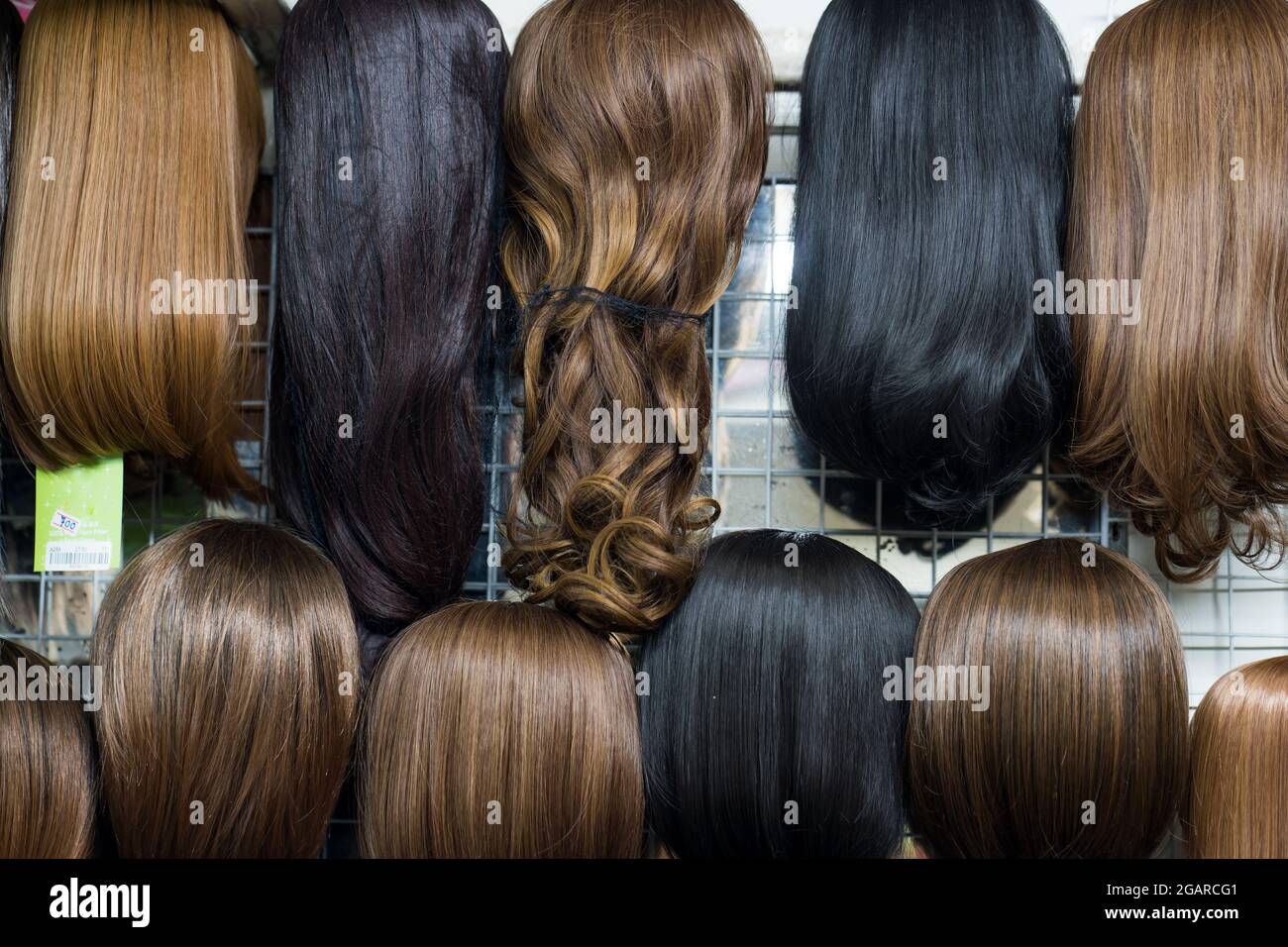 Different colored wigs hi-res stock photography and images - Alamy