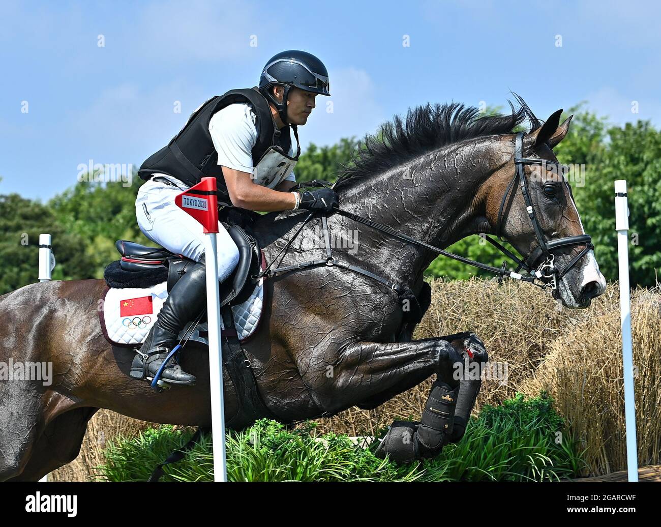 Tokyo, Japan. 1st Aug, 2021. China's Sun Huadong competes with his ...