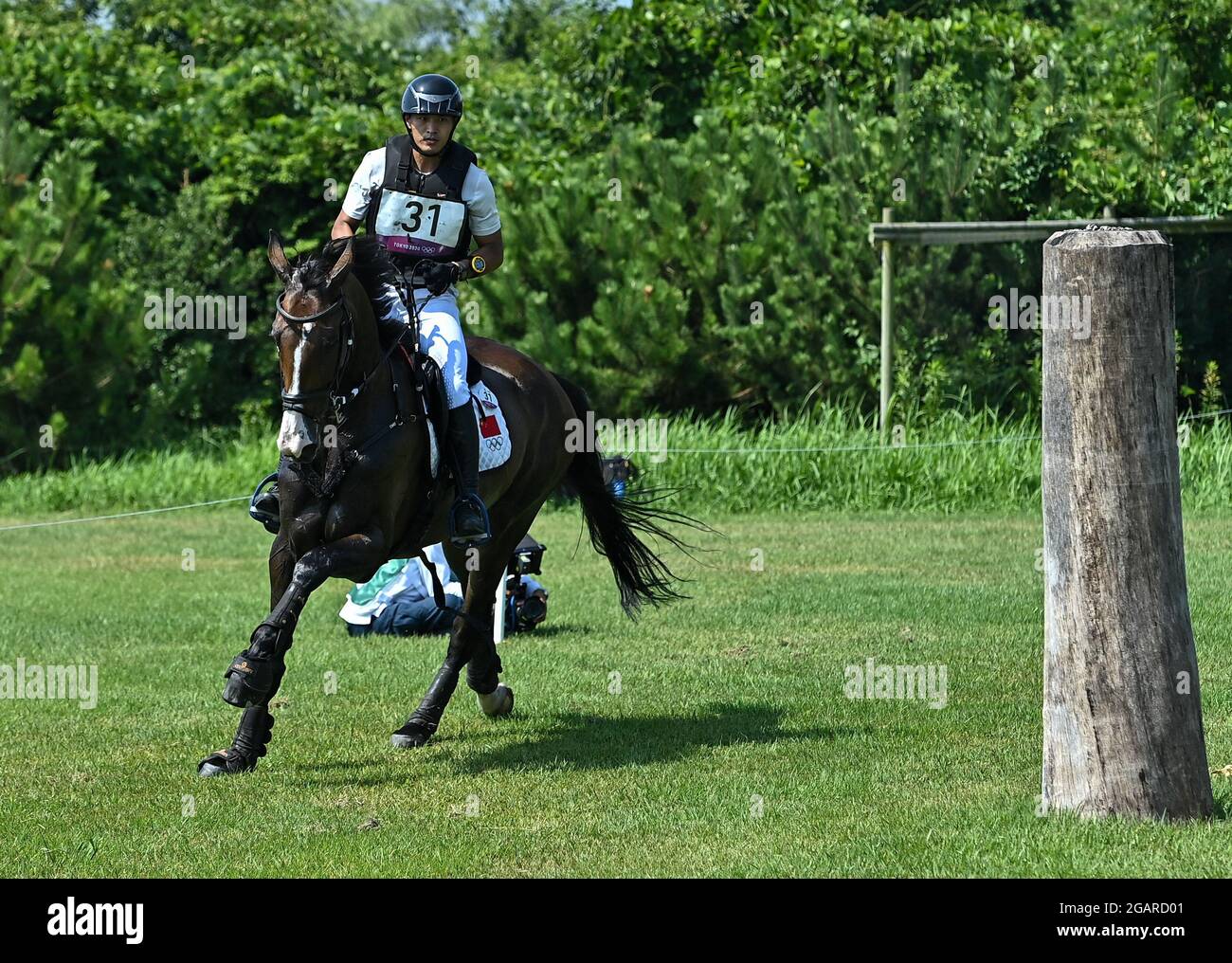 Tokyo, Japan. 1st Aug, 2021. China's Sun Huadong competes with his ...