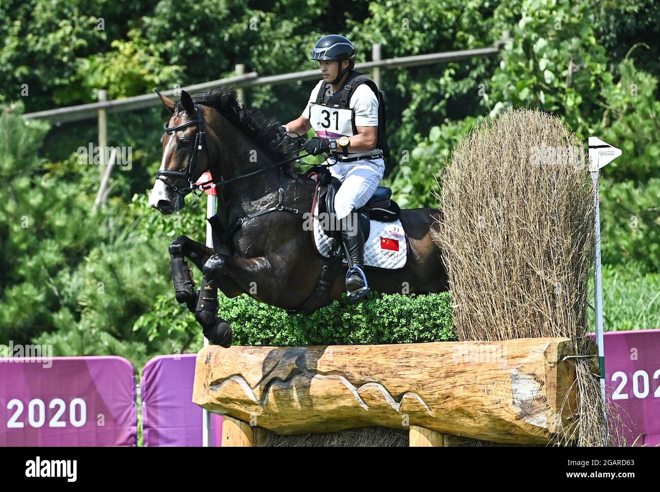 Tokyo, Japan. 1st Aug, 2021. China's Sun Huadong competes with his ...