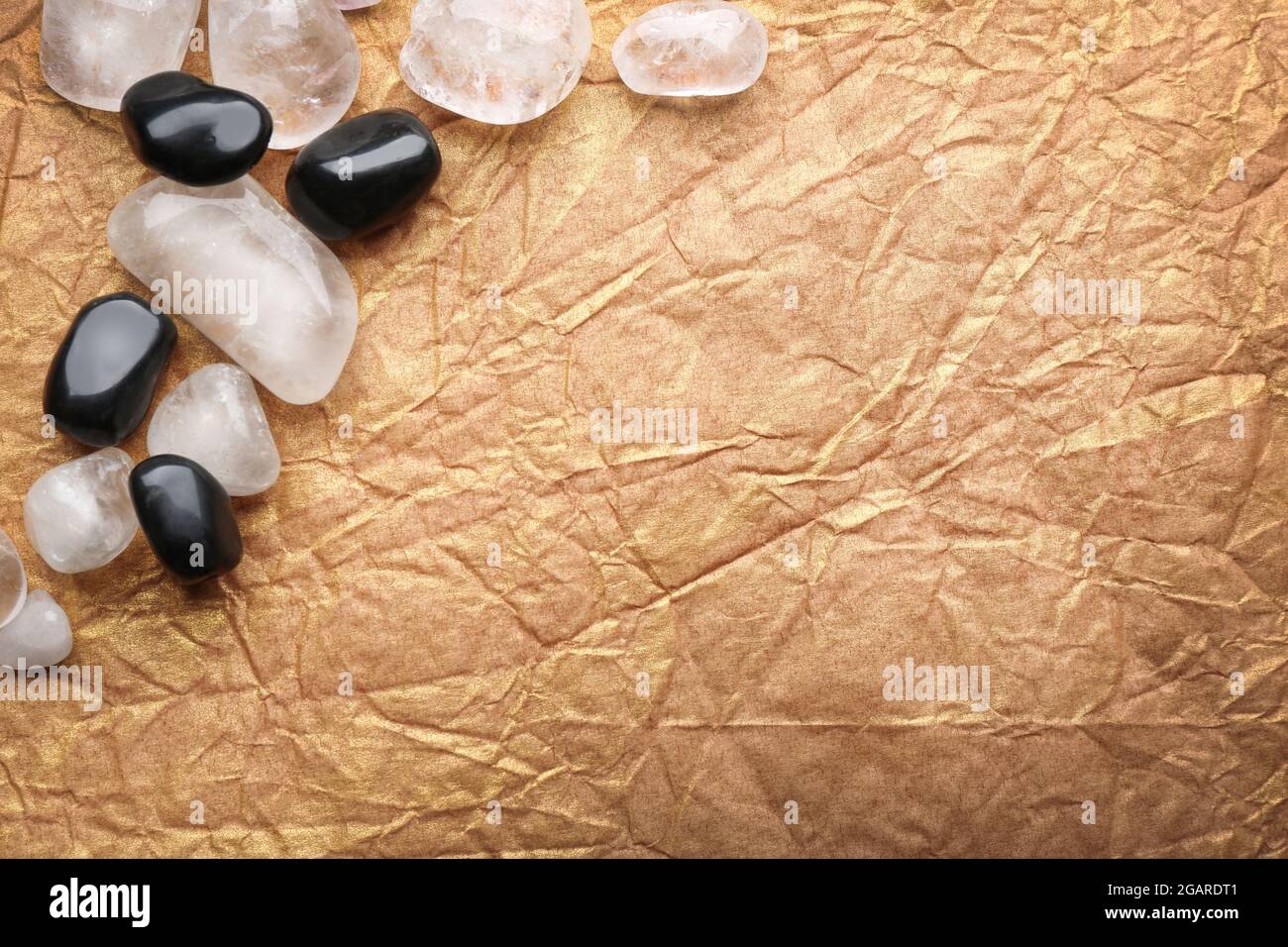 Semiprecious stones on craft paper background Stock Photo - Alamy