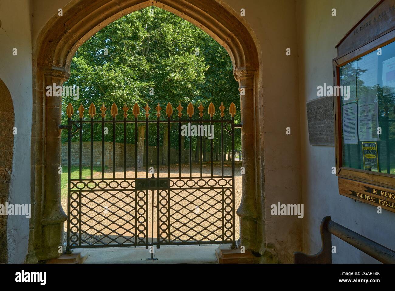 The arched entrance porch and gate of St Mary and All Saints 15th ...