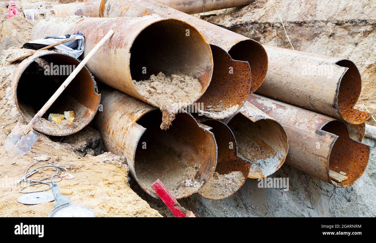 Fragments of old large water pipes. After many years of operation ...