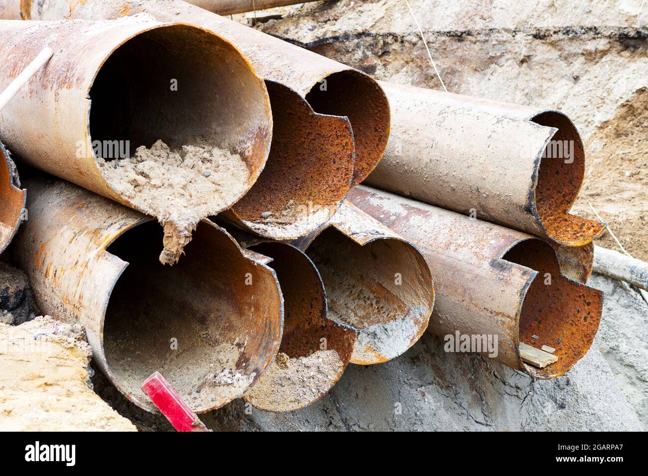 Fragments of old large water pipes. After many years of operation ...