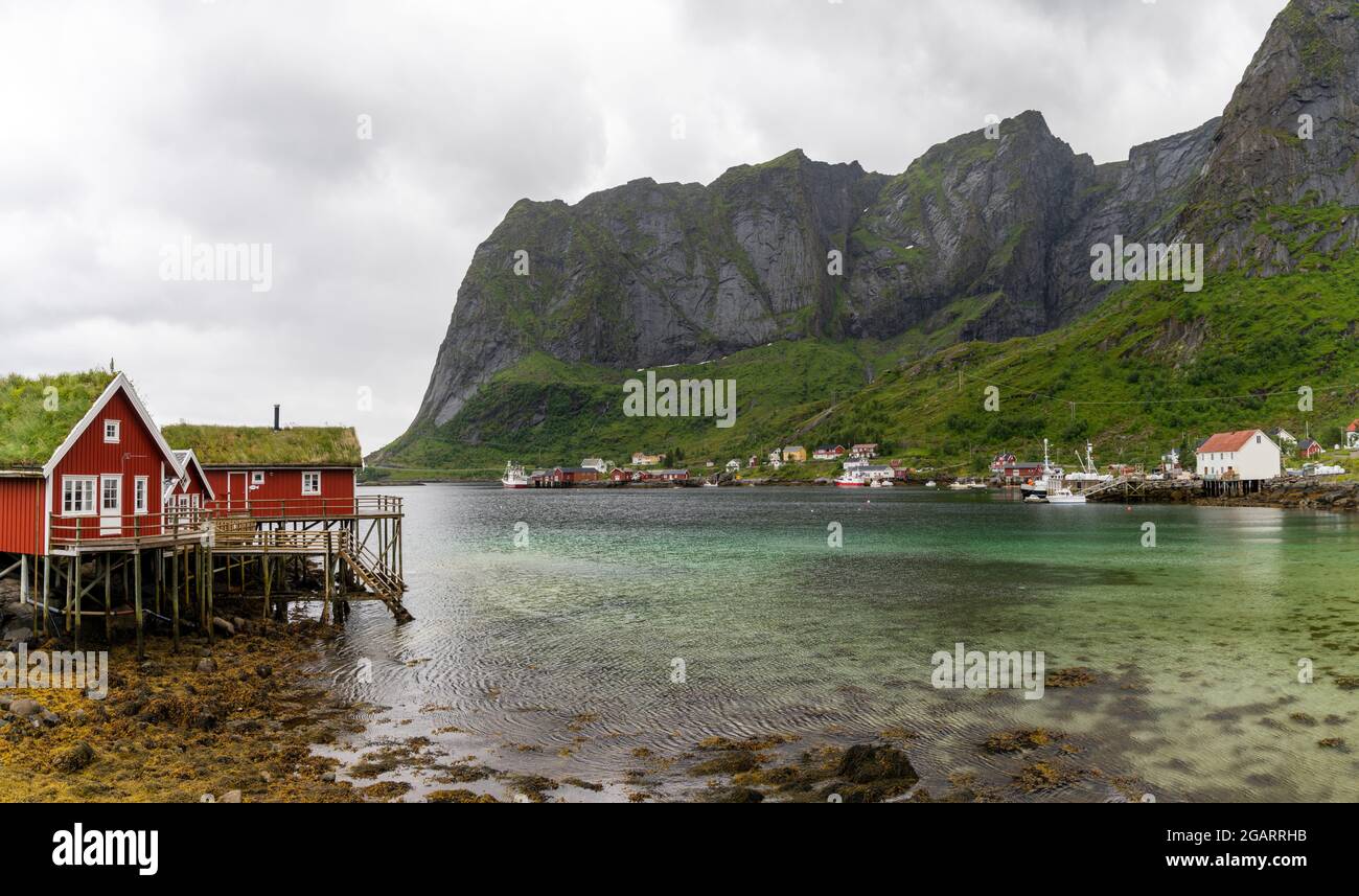 Moskenes, Norway - 20 July, 2021: colorful red wooden houses on stilts ...