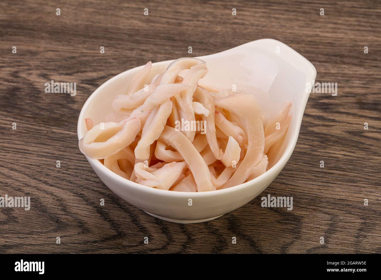Tasty Marinated squid slices snack in the bowl Stock Photo - Alamy