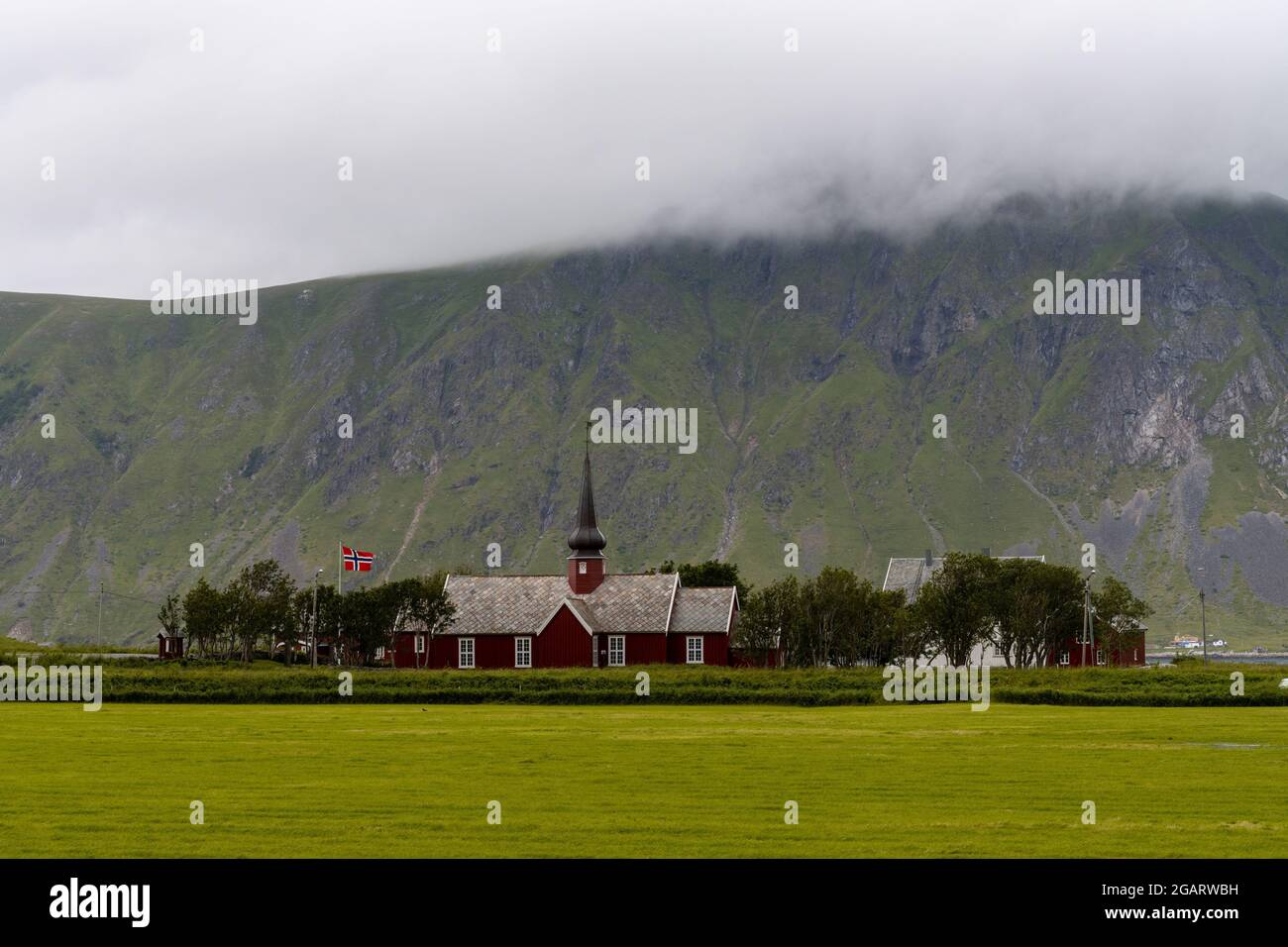 view of the red wooden country church in Flakstad on the Lofoten ...