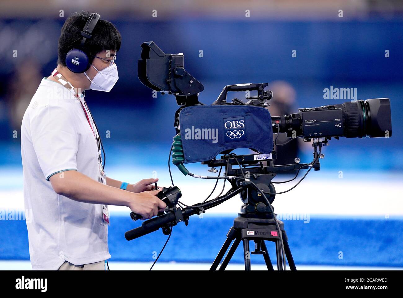 A camera man films the athletes in action during the Men's Floor ...