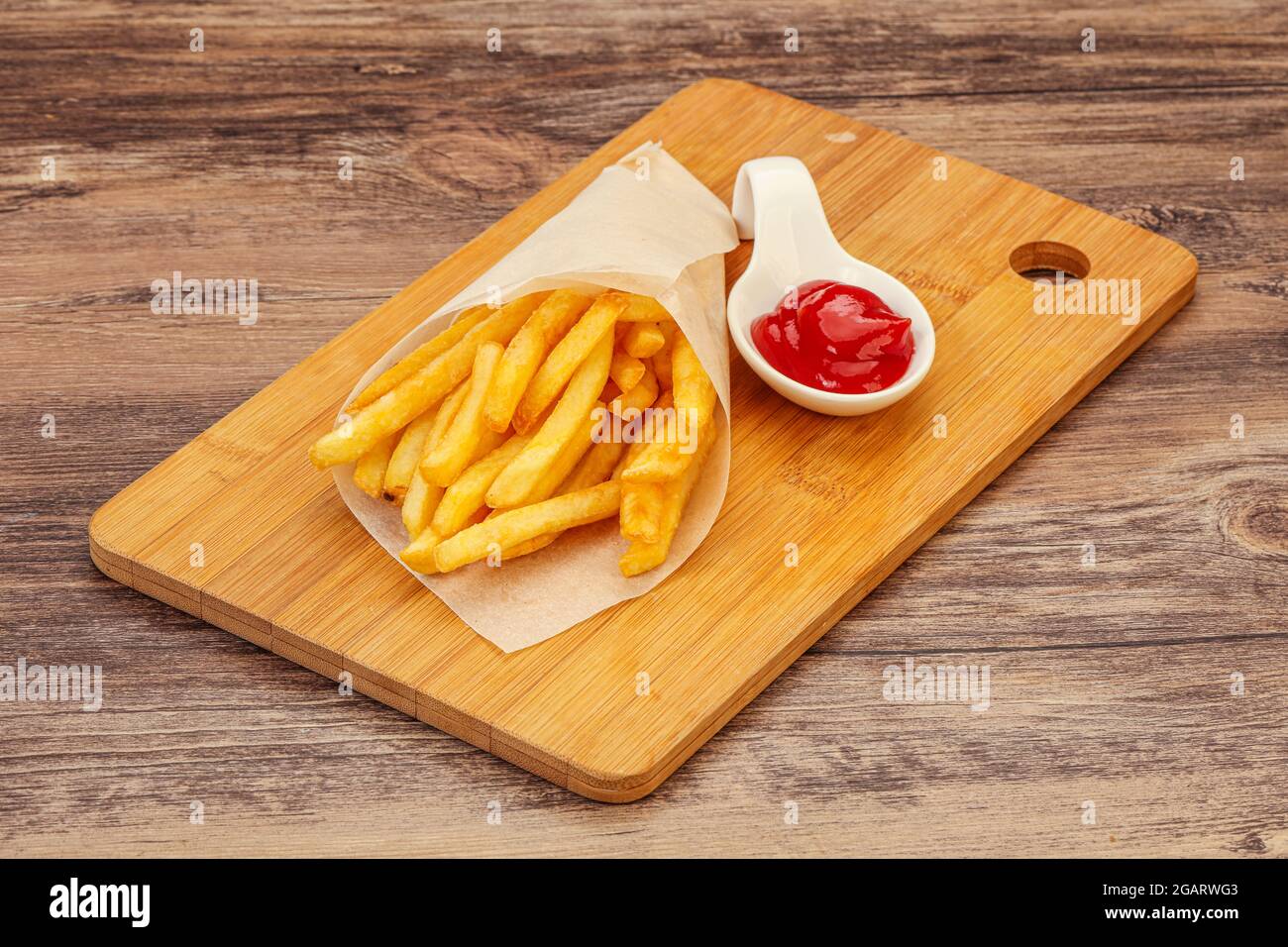 French Fry potato with tomato sauce Stock Photo - Alamy