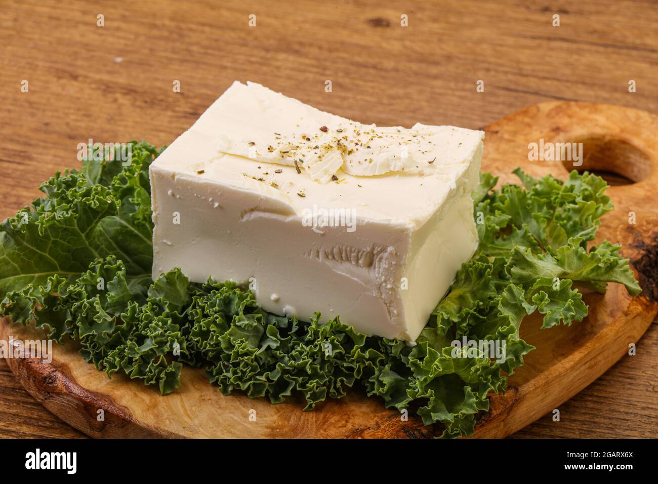 Traditional tasty Greek Feta soft cheese brick Stock Photo - Alamy