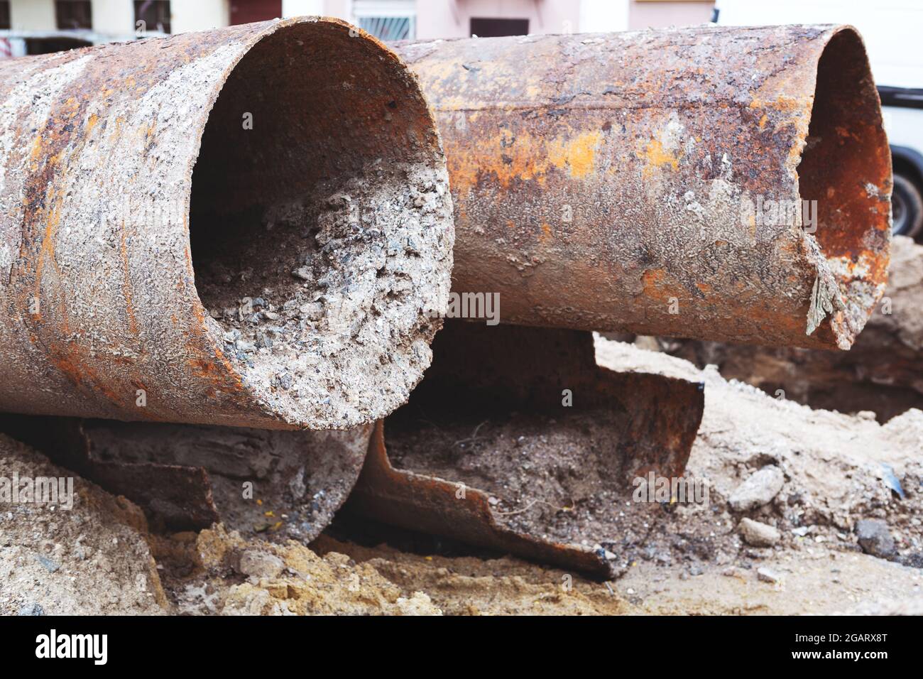 Fragments of old large water pipes. After many years of operation ...