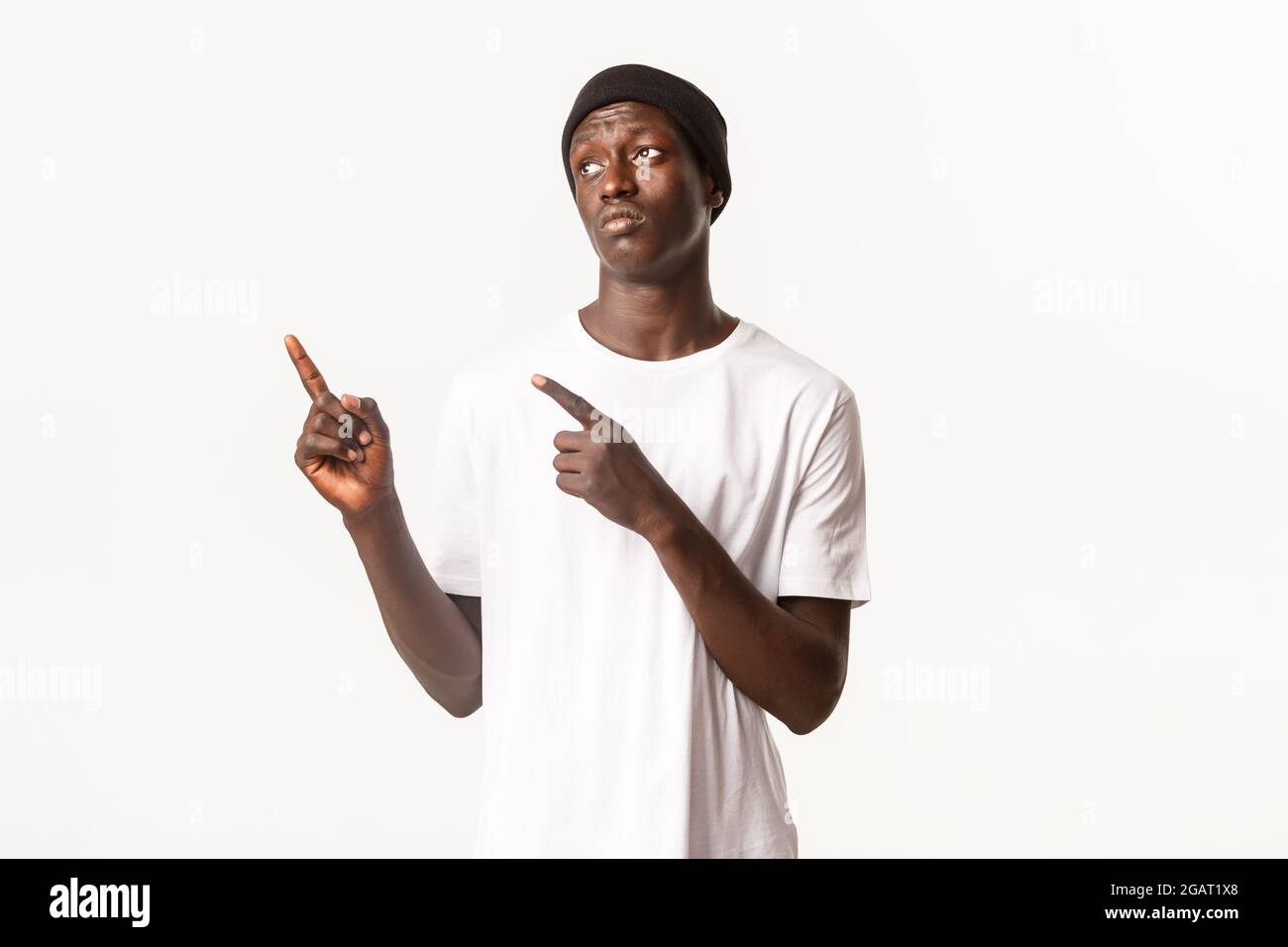 Portrait of upset gloomy african-american guy in beanie, pouting sad ...