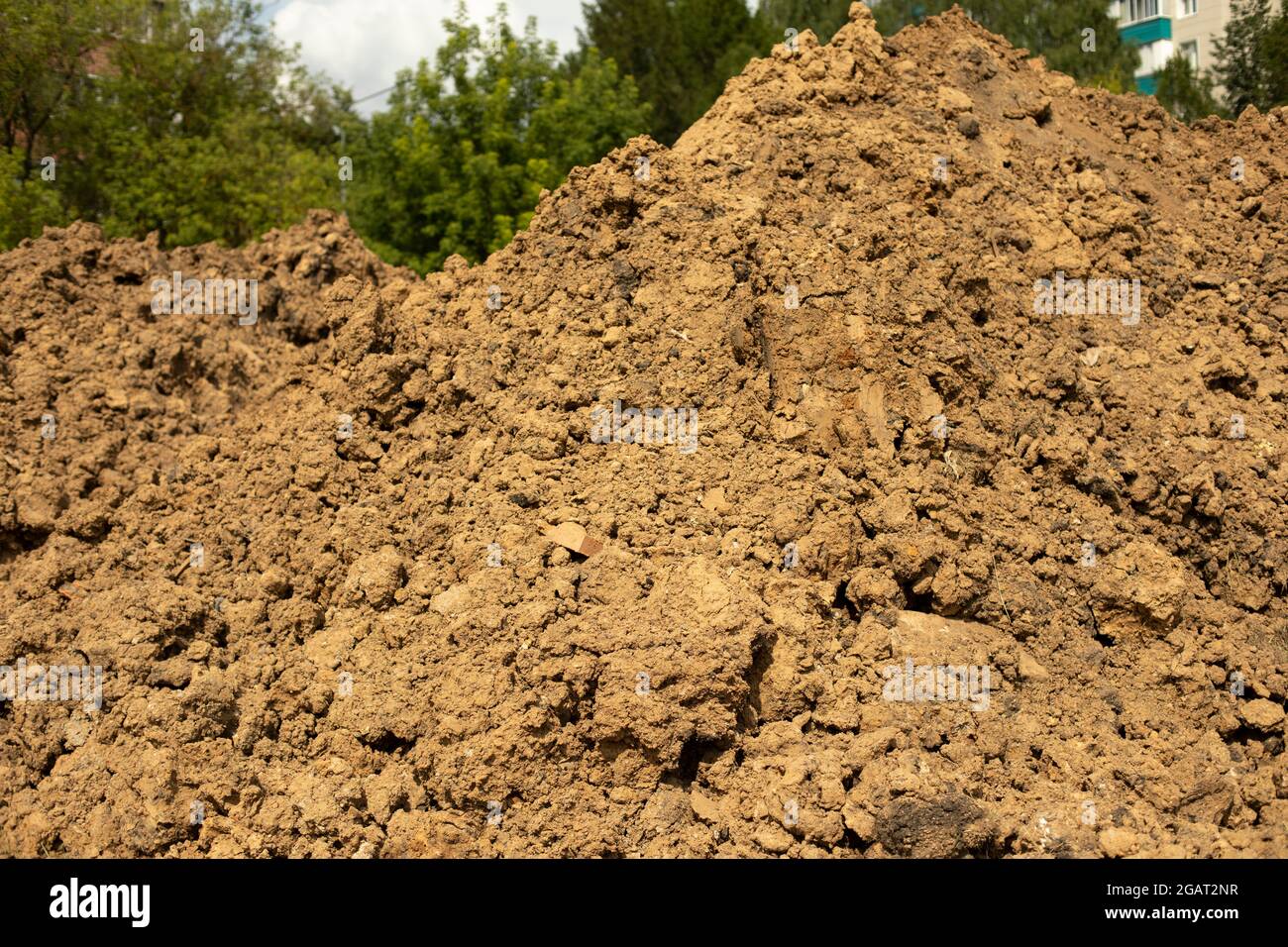 Dug up earth. Construction excavation of soil. Dump of land at a ...