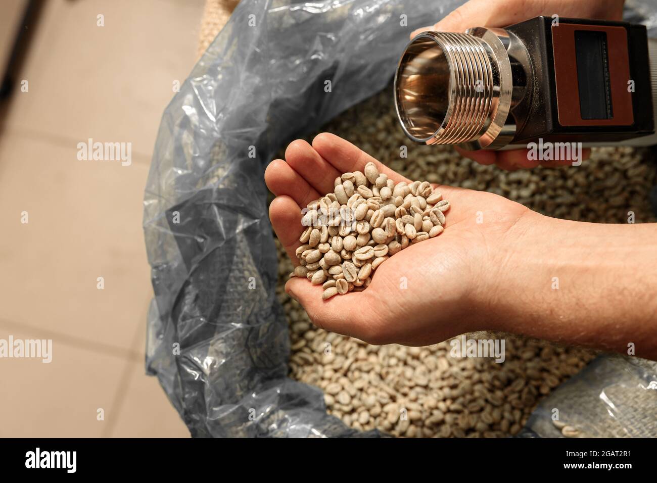 raw coffee testing before roast Stock Photo - Alamy