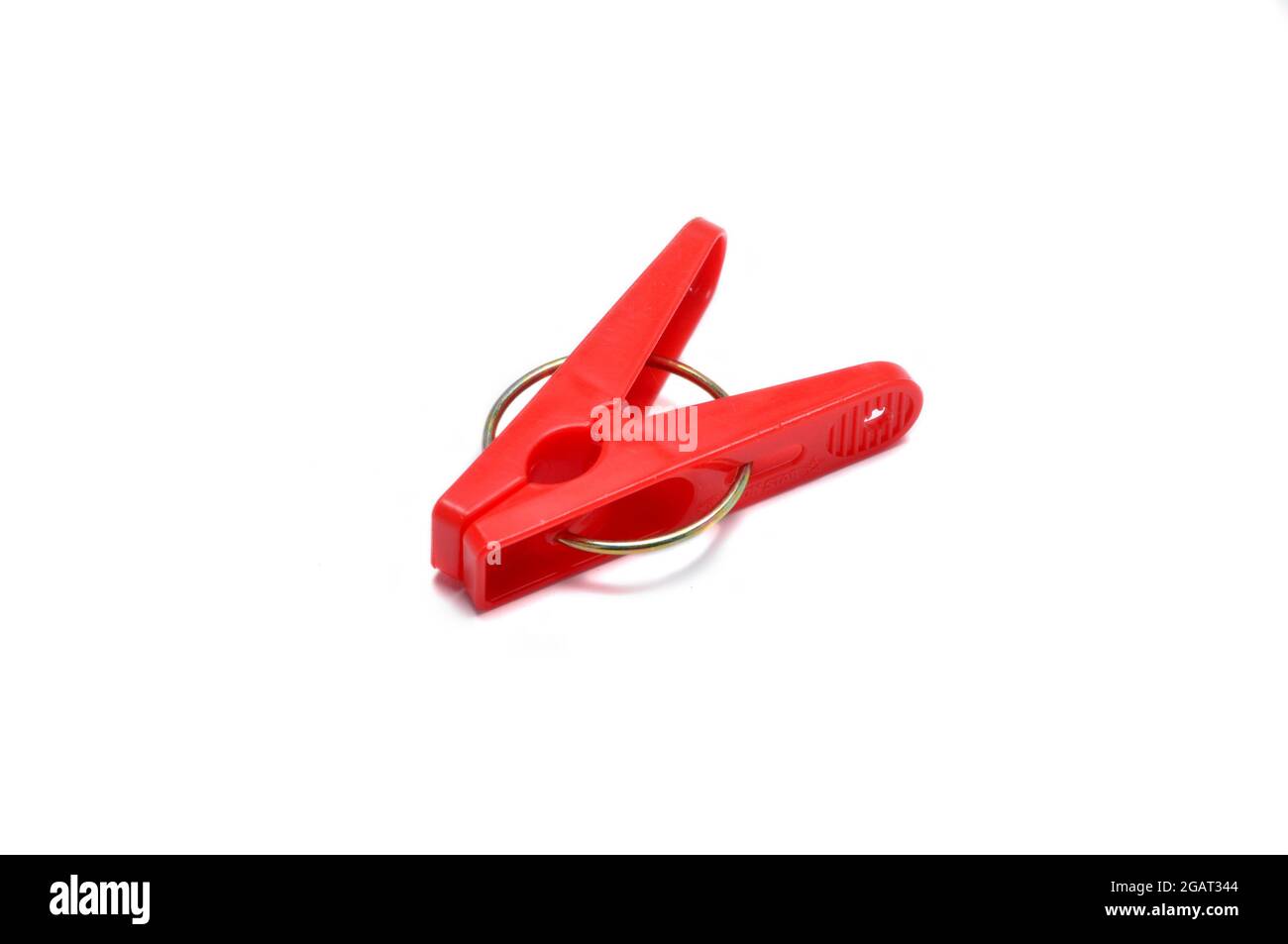 Red color clothespin white background studio shoot Stock Photo - Alamy
