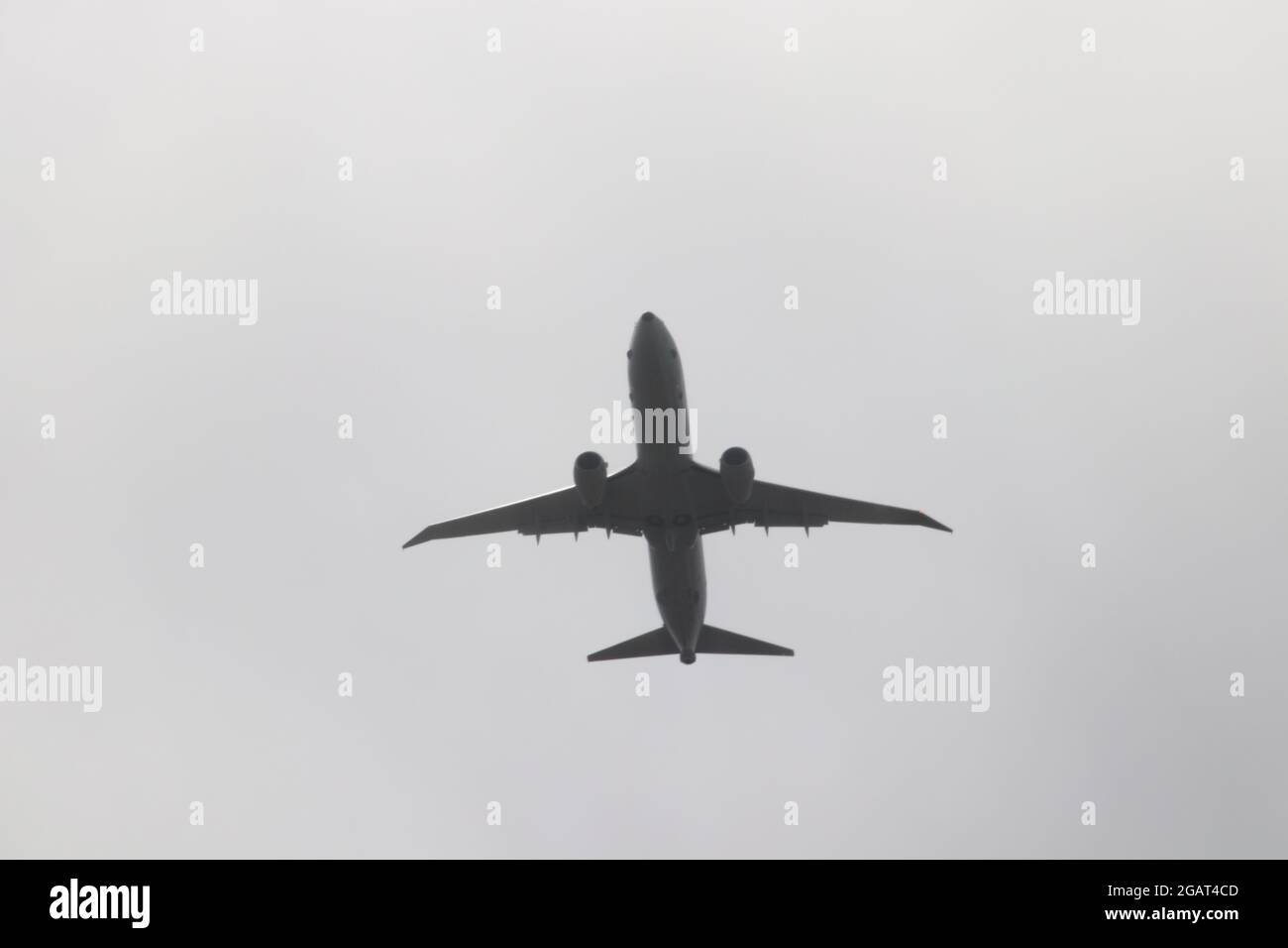 Plane disappearing into cloud hi-res stock photography and images - Alamy