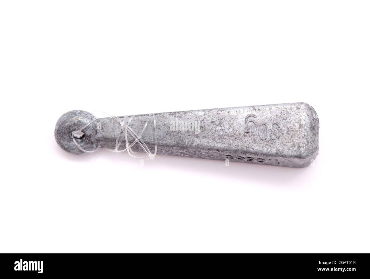 Old lead sinker with a bit of line still attached, isolated on white ...