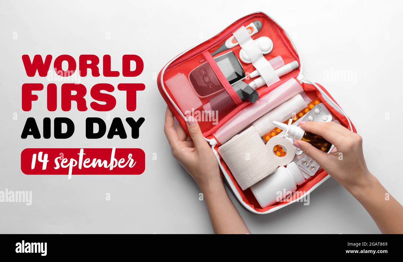 Female hands with first aid kit on white background Stock Photo - Alamy