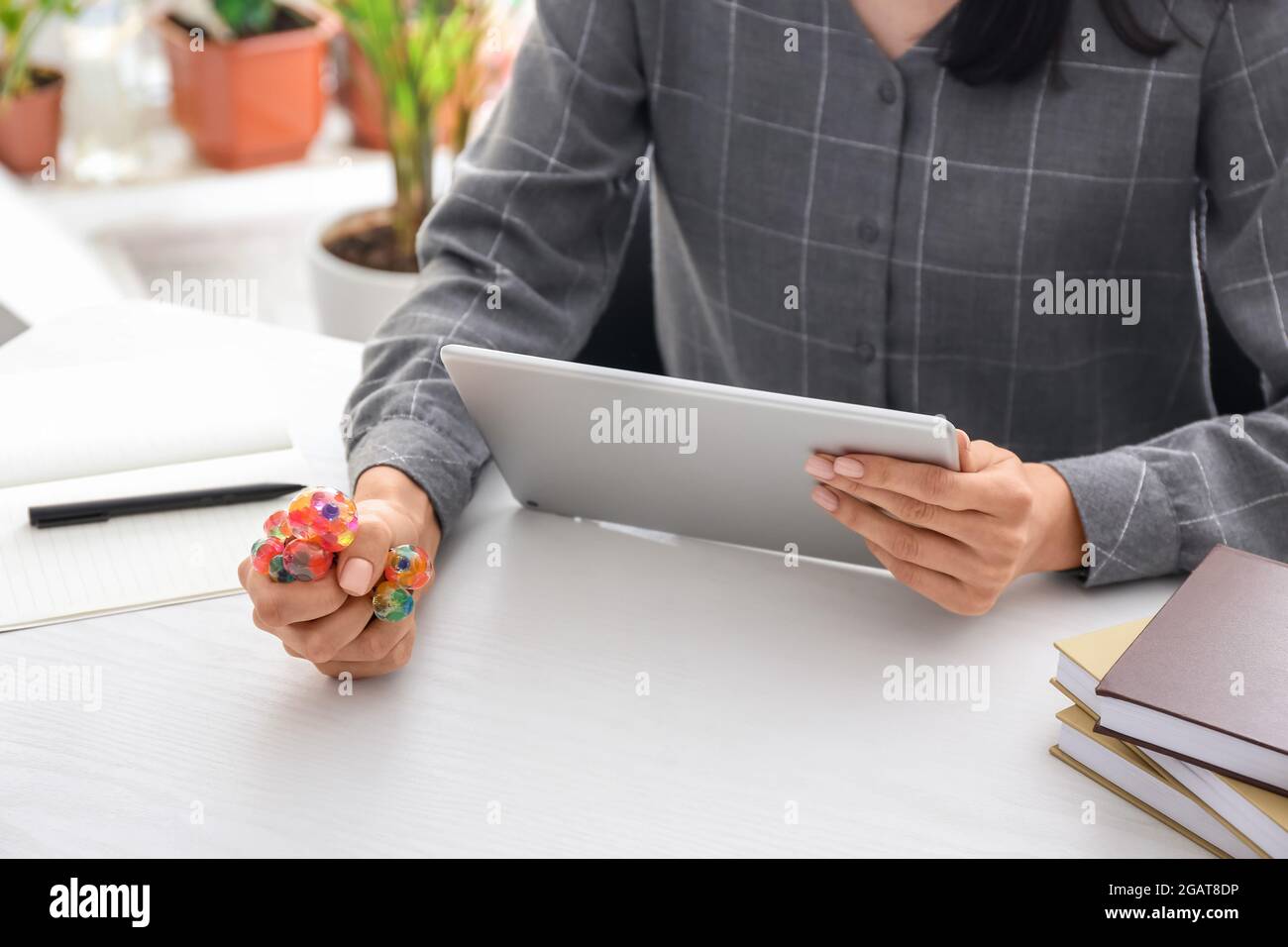 Female office using exercise ball hi-res stock photography and images ...