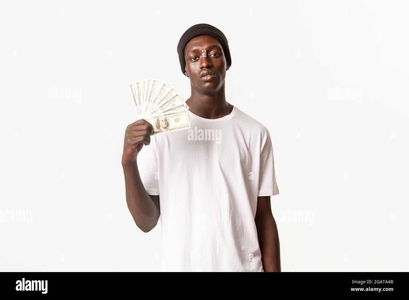 Portrait of sassy and cool african-american rich guy showing money and ...