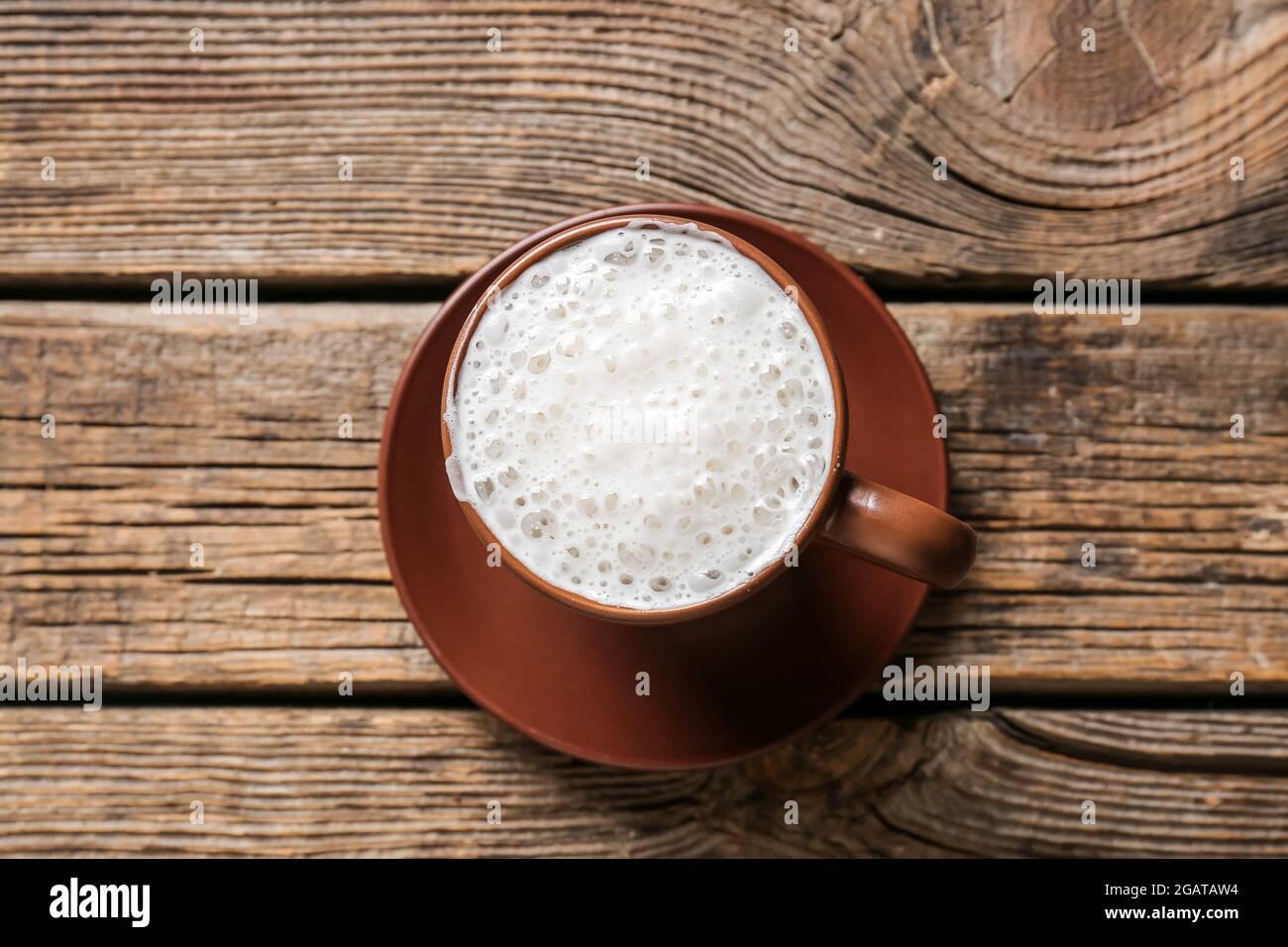 Cup of coffee on wooden background Stock Photo - Alamy