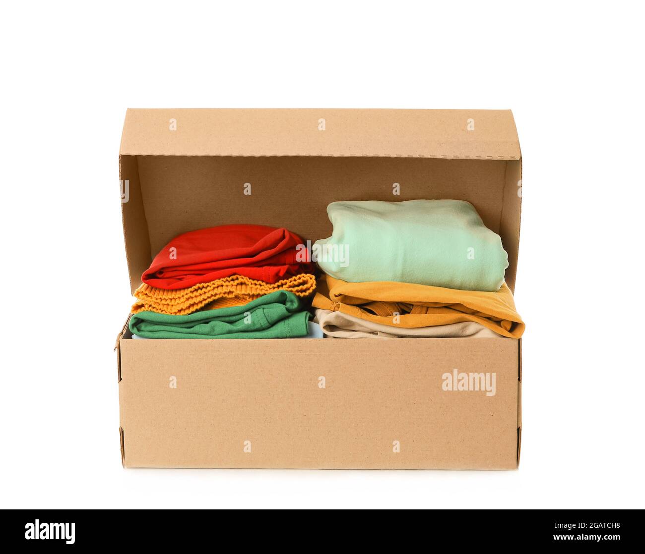Wardrobe box with clothes on white background Stock Photo - Alamy