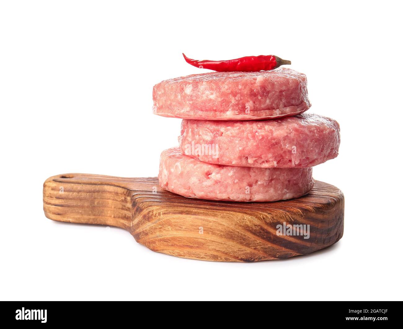 Wooden board with raw cutlets made of fresh forcemeat on white ...