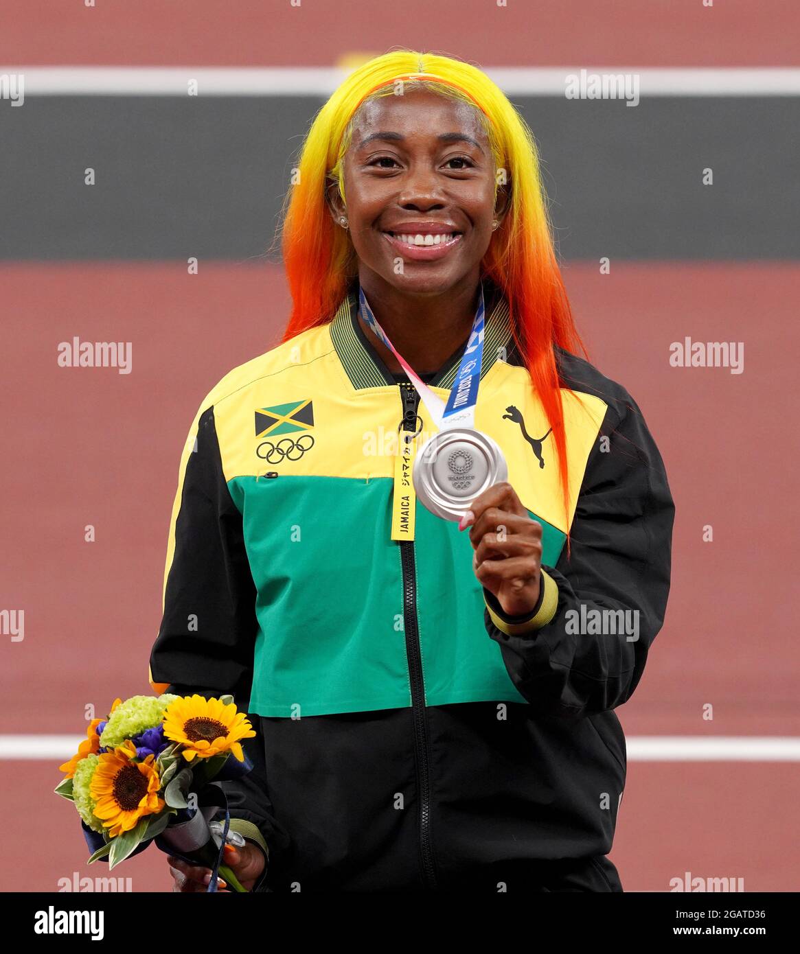 Jamaica's Shelly-Ann Fraser-Pryce poses with her silver medal after ...