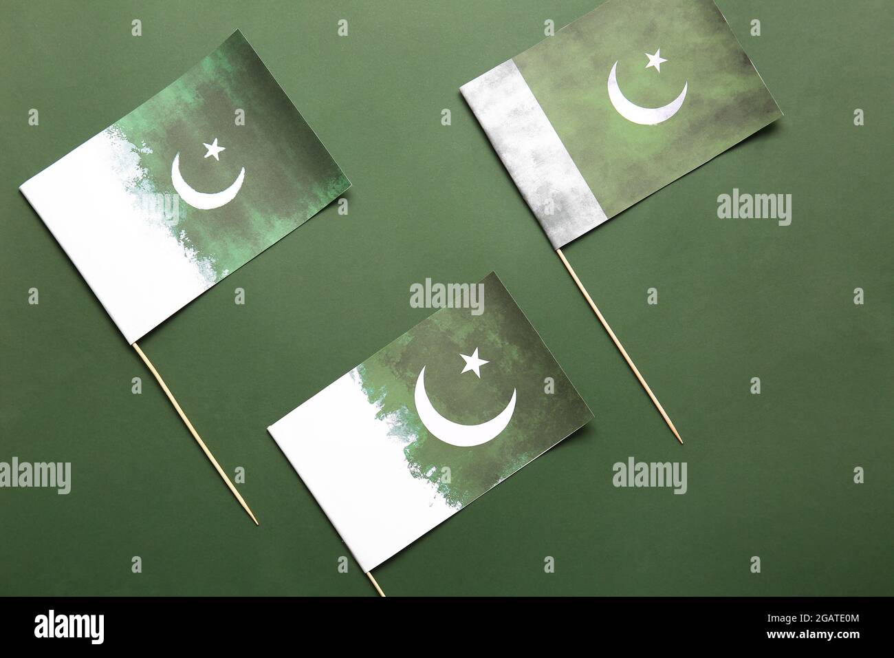 Pakistan flags on color background Stock Photo - Alamy