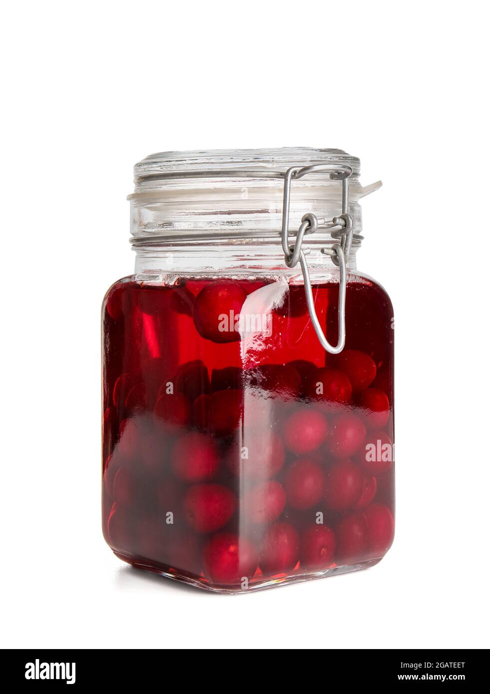 Glass jar with sweet cherry wine on white background Stock Photo - Alamy