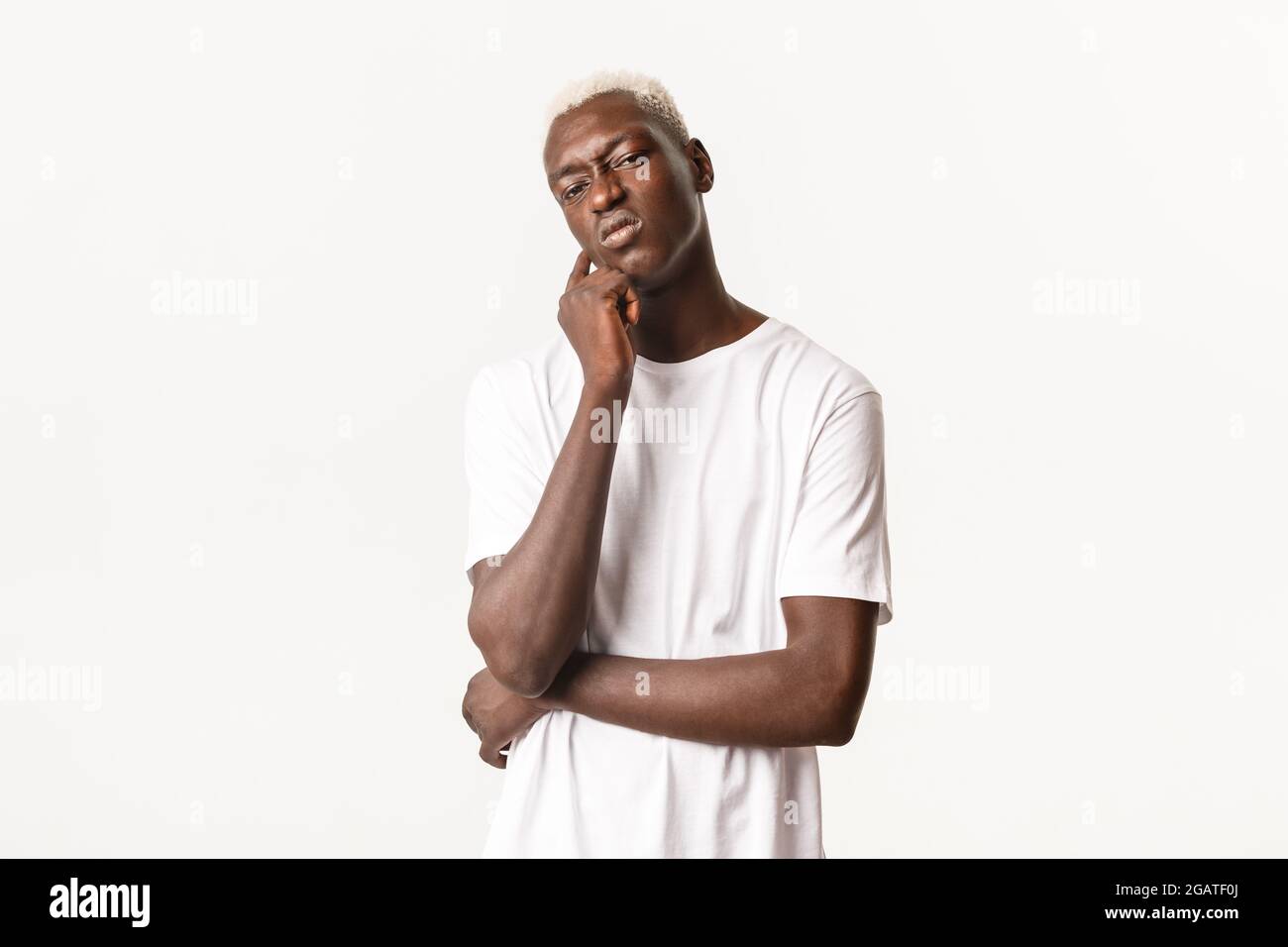 Portrait of disappointed, angry african-american blond man looking with ...