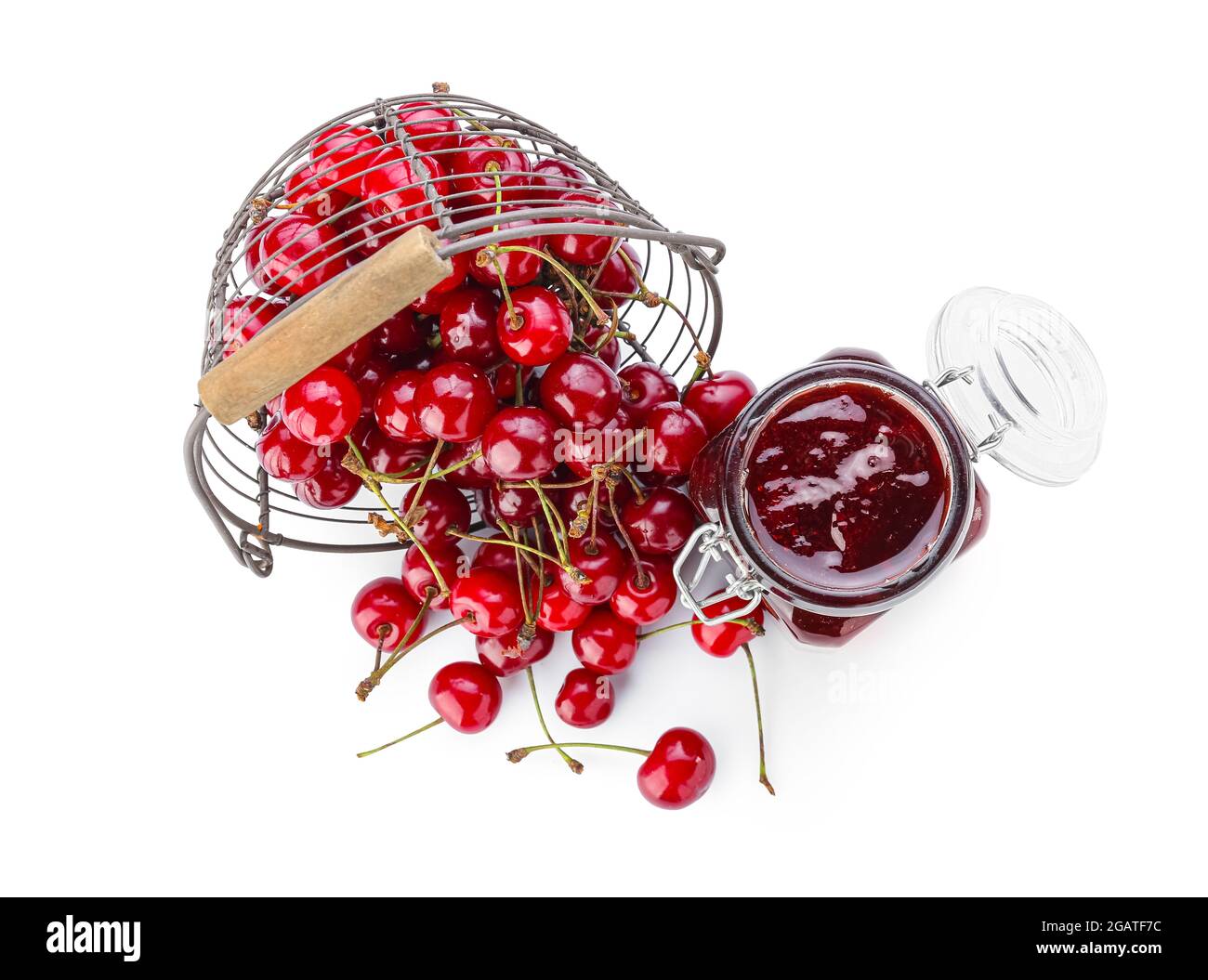 Basket with ripe cherry and jam on white background Stock Photo - Alamy