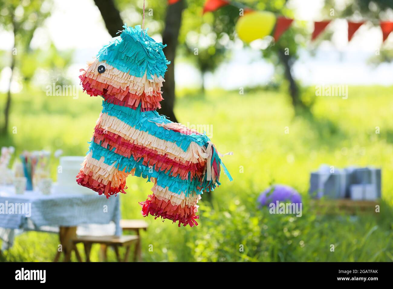 Colorful Mexican pinata hanging outdoors Stock Photo - Alamy