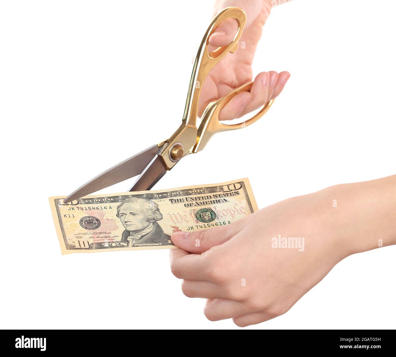 Hands with scissors cutting dollar banknote, isolated on white Stock ...