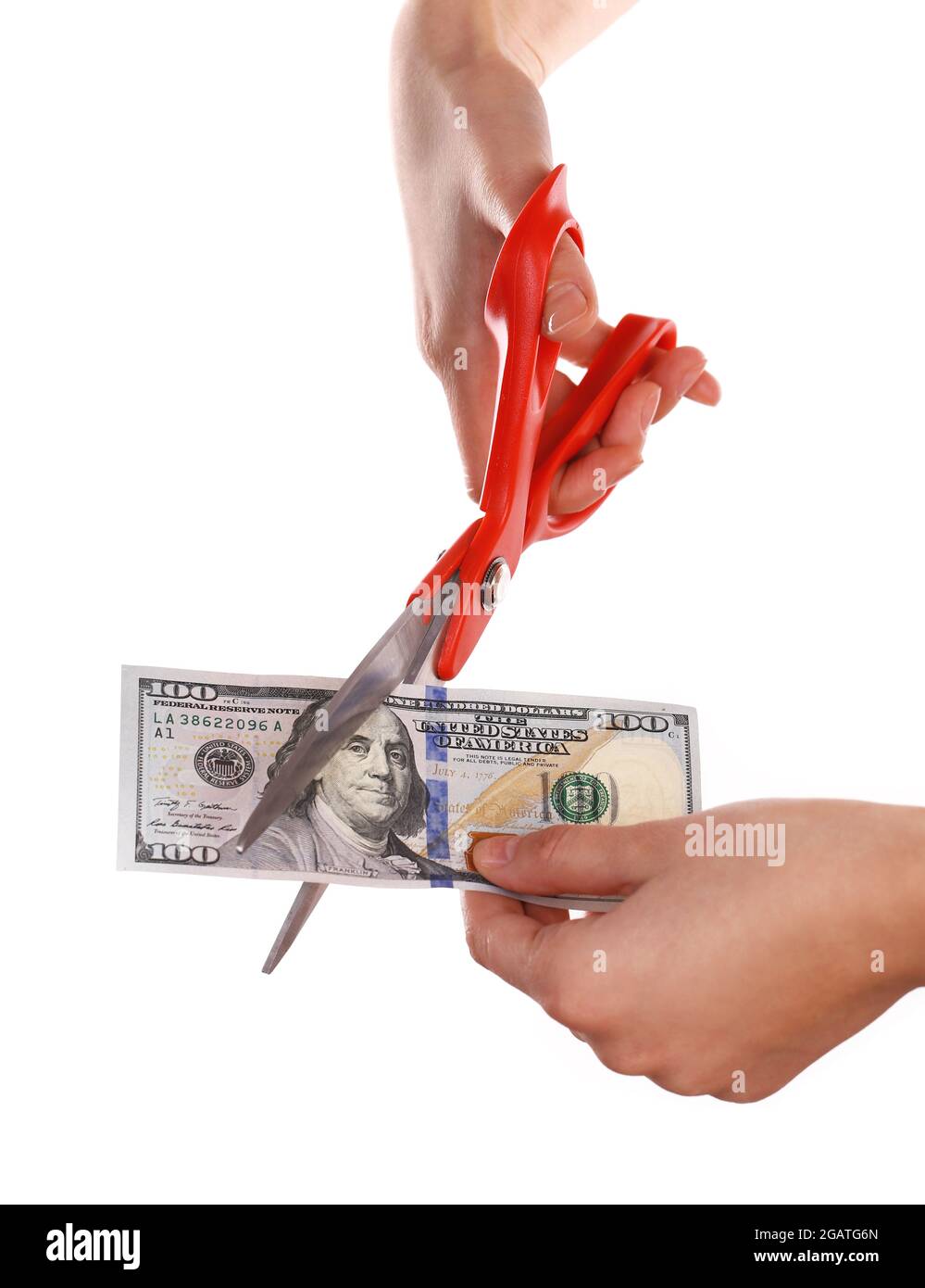 Hands with scissors cutting dollar banknote, isolated on white Stock ...