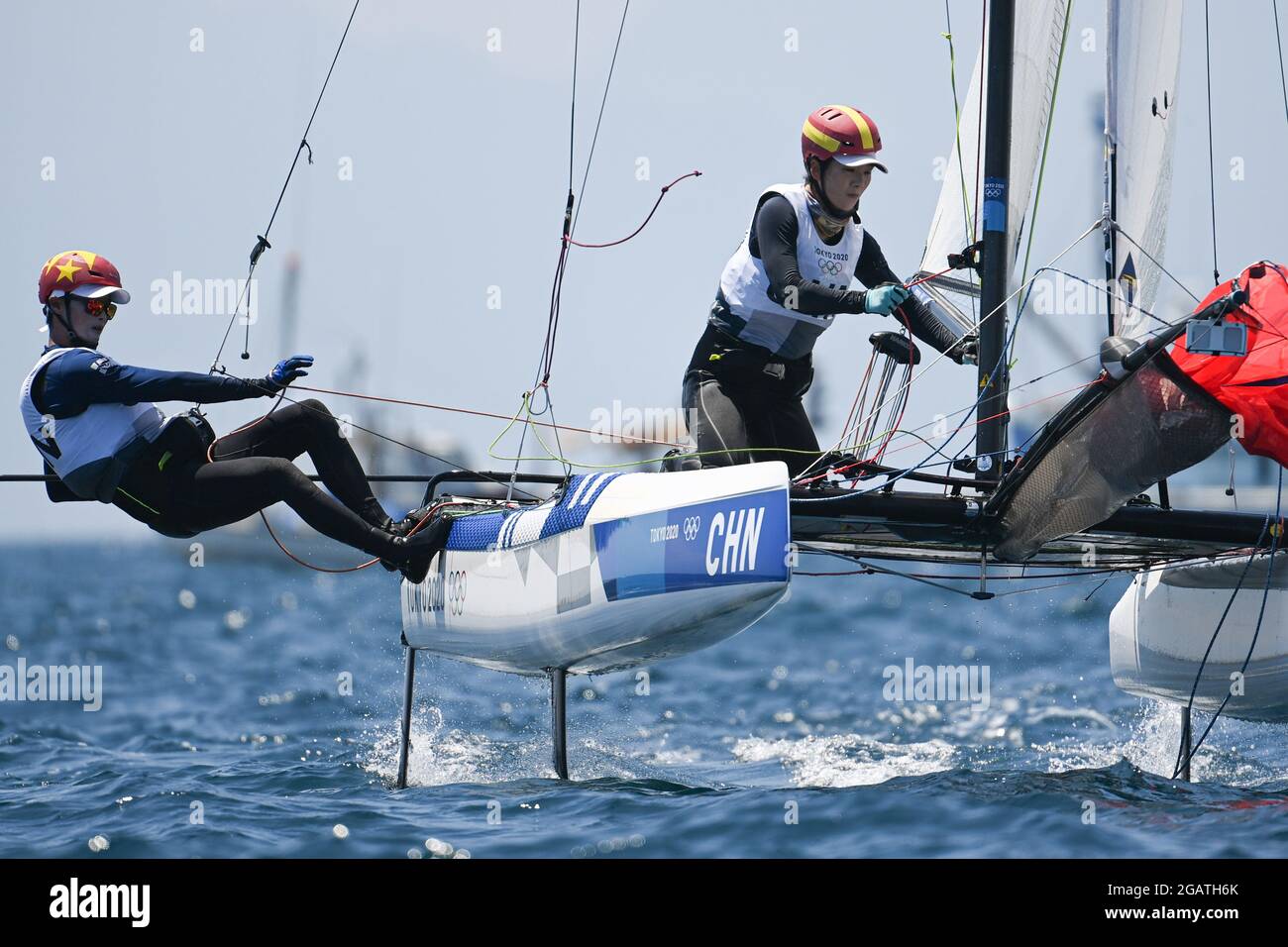 Kanagawa, Japan. 1st Aug, 2021. Yang Xuezhe (L) and Hu Xiaoxiao of ...