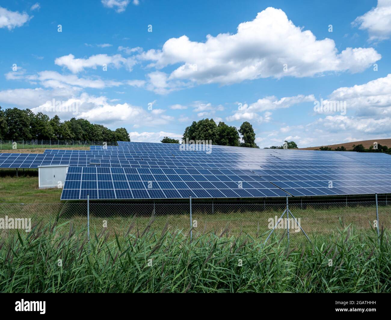 Solar park in a field Stock Photo - Alamy