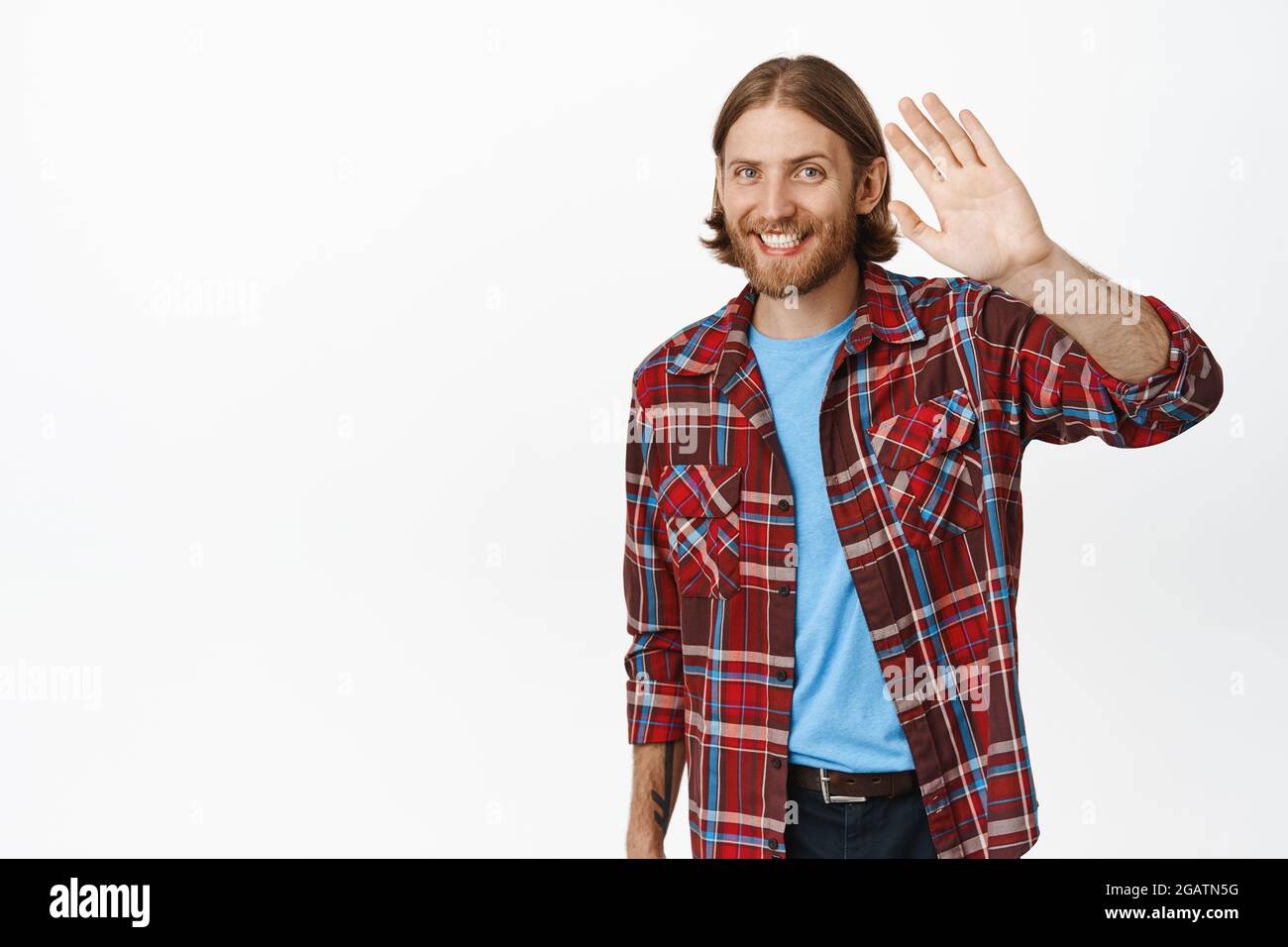 Hello friend. Smiling friendly blond man waving hand at you, say hi ...