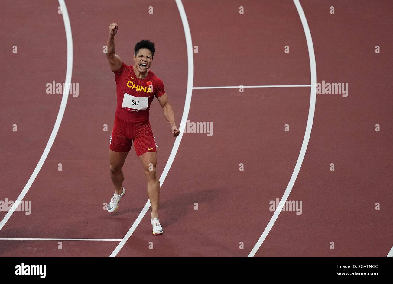 Tokyo, Japan. 1st Aug, 2021. Su Bingtian of China reacts during the men's 100m semifinal at ...
