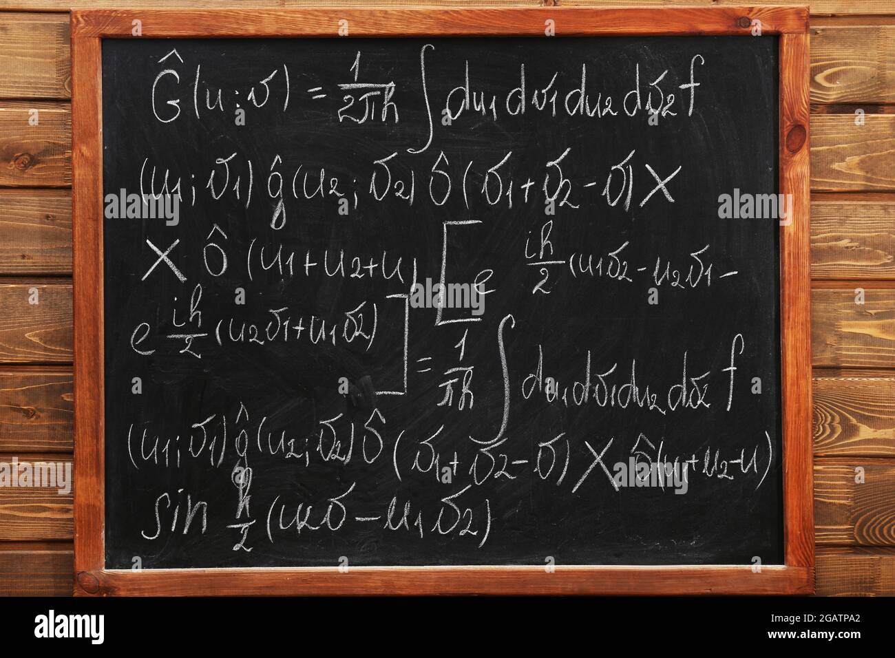 School blackboard with formulas on a brick wall Stock Photo - Alamy