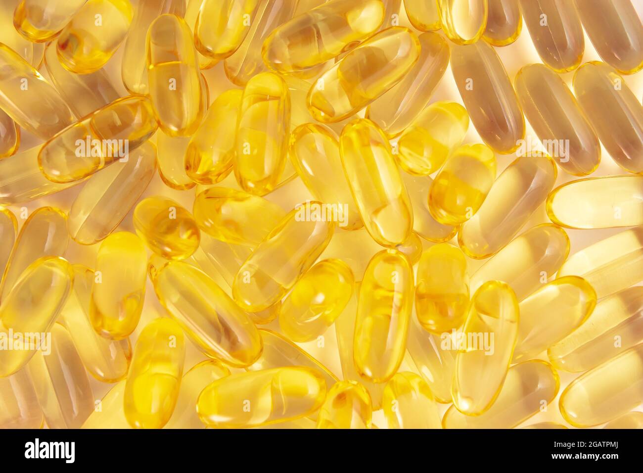 fish oil omega 3 on white background texture Stock Photo - Alamy