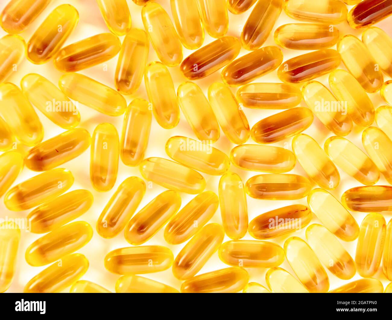 fish oil omega 3 on white background texture Stock Photo - Alamy