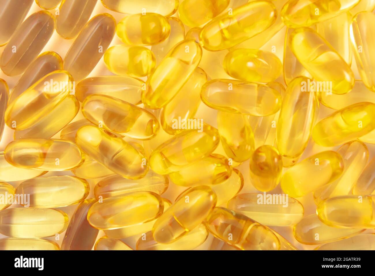 fish oil omega 3 on white background texture Stock Photo - Alamy