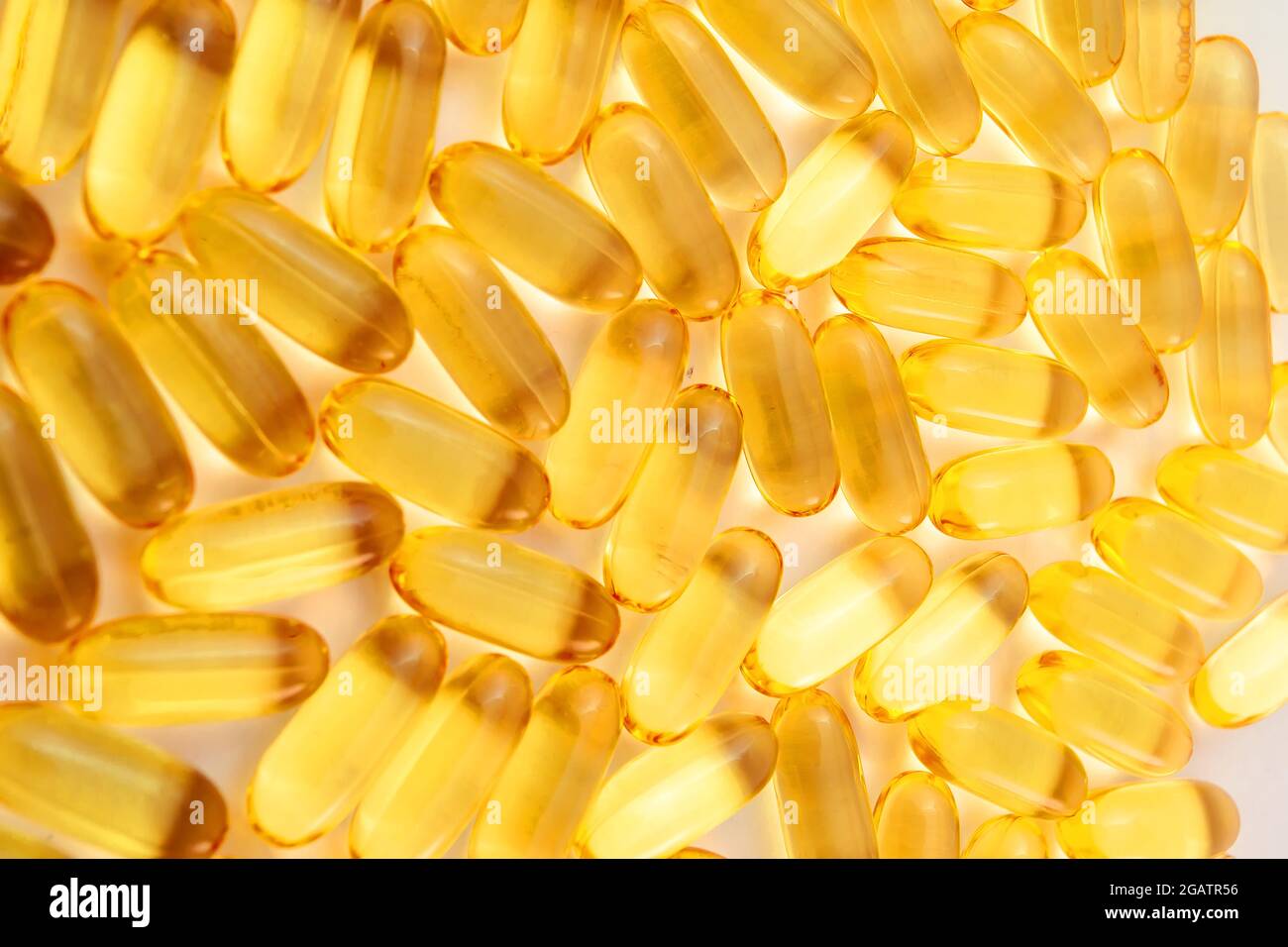 fish oil omega 3 on white background texture Stock Photo - Alamy